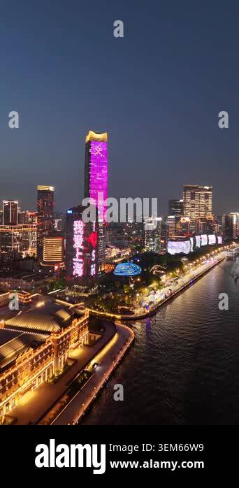 Aerial view of the modern Shanghai skyline at night, featuring the ...