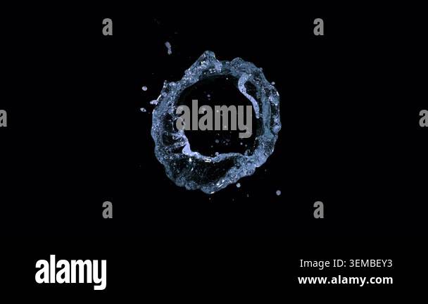 Super Slow Motion Shot of Rotating Liquid Ring Moving Towards Camera at ...