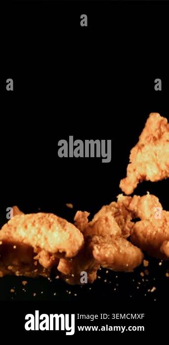 Nuggets fly up and fall down. Filmed is slow motion 1000 fps. High ...