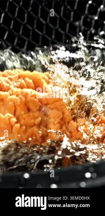 Nuggets with splash oil. Filmed is slow motion 1000 fps. High quality ...
