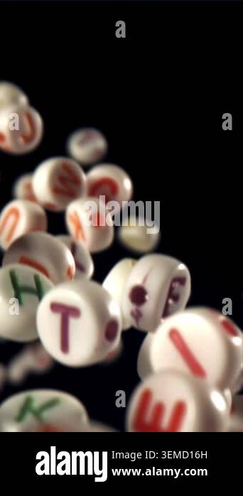 English letters fly and fall. Filmed on a high-speed camera at 1000 fps ...