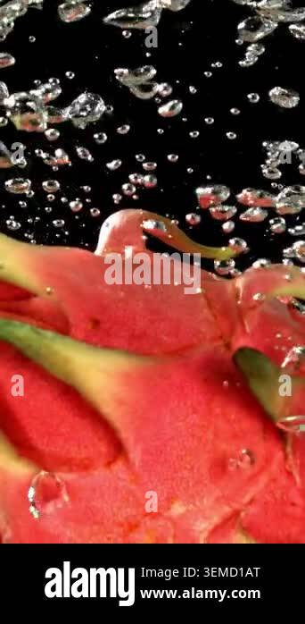 Super slow motion dragon fruit . Filmed on a high-speed camera at 1000 ...