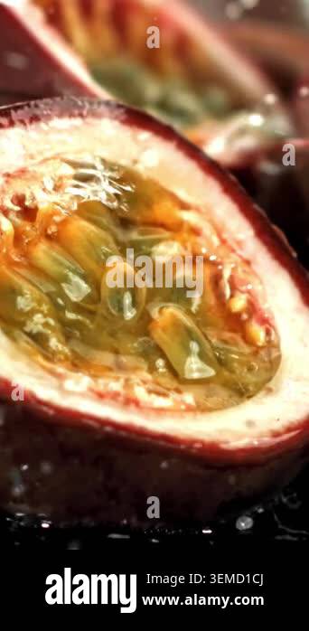 Super slow motion passion fruits . Filmed on a high-speed camera at ...