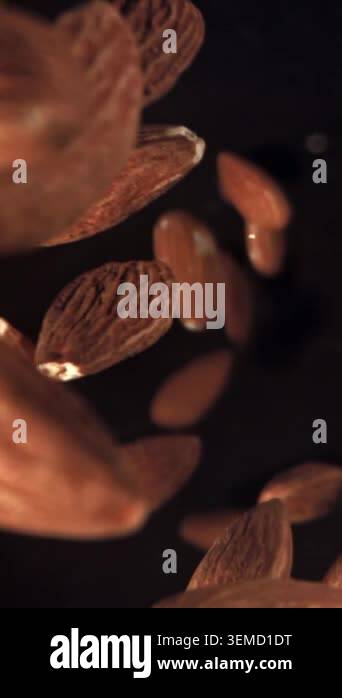 The almonds fall down. Filmed on a high-speed camera at 1000 fps. High ...