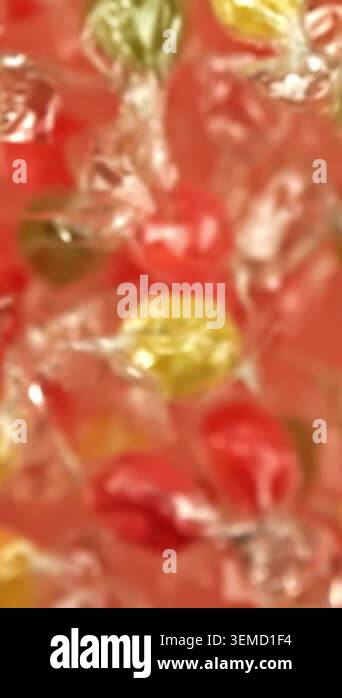 Super slow motion colorful candies. Filmed on a high-speed camera at ...