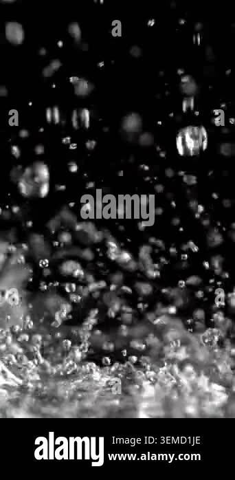 Super slow motion falling raindrops . Filmed on a high-speed camera at ...