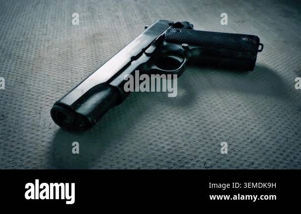 Gun Picked Up Off Ground Barehanded Or Gloved Stock Video Footage - Alamy