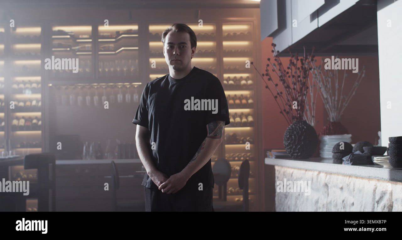 Caucasian man chef stands in wine bar Stock Video Footage - Alamy