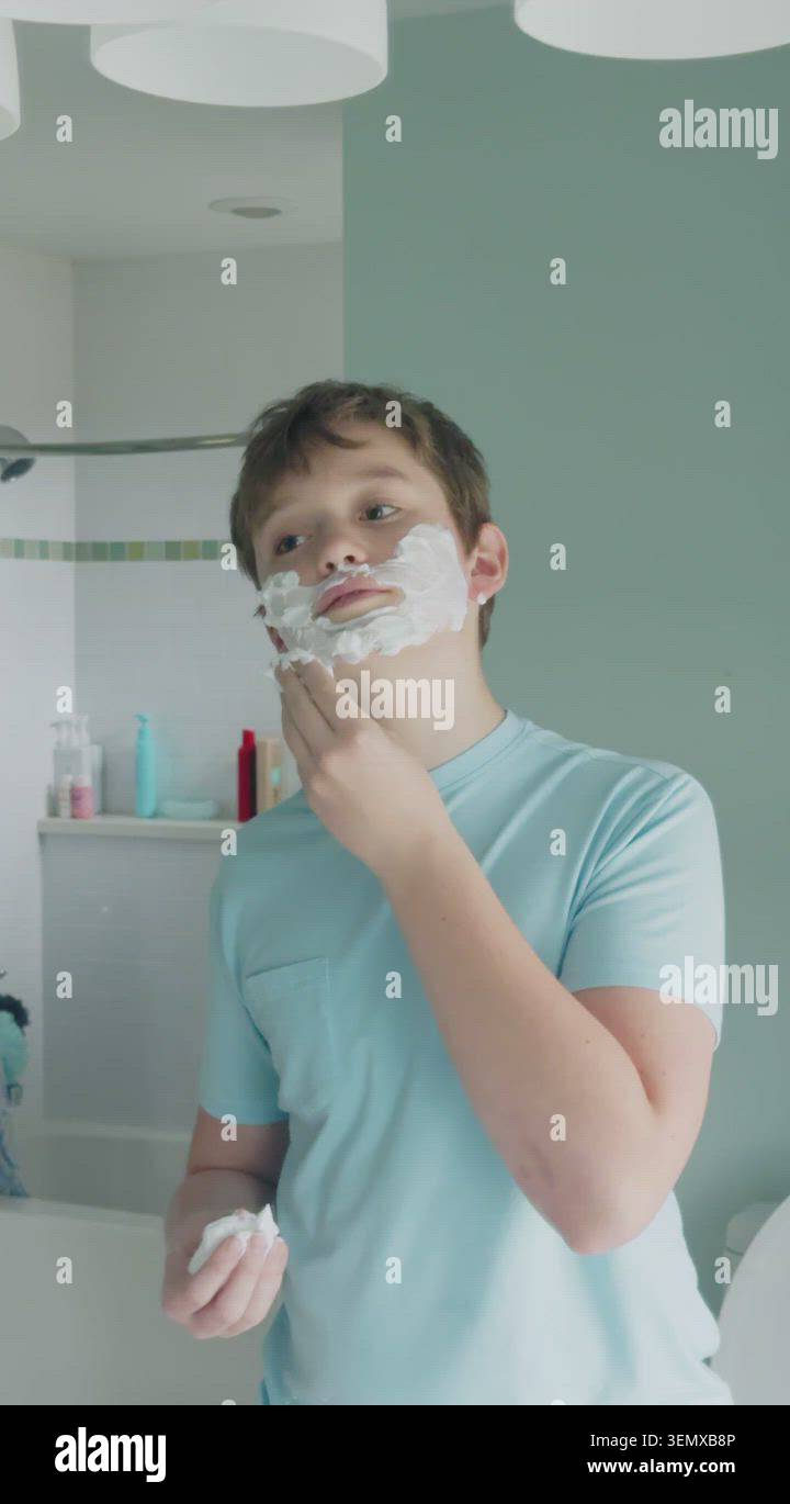 Teen boy video Portrait Lifestyle shave cream Stock Video Footage - Alamy