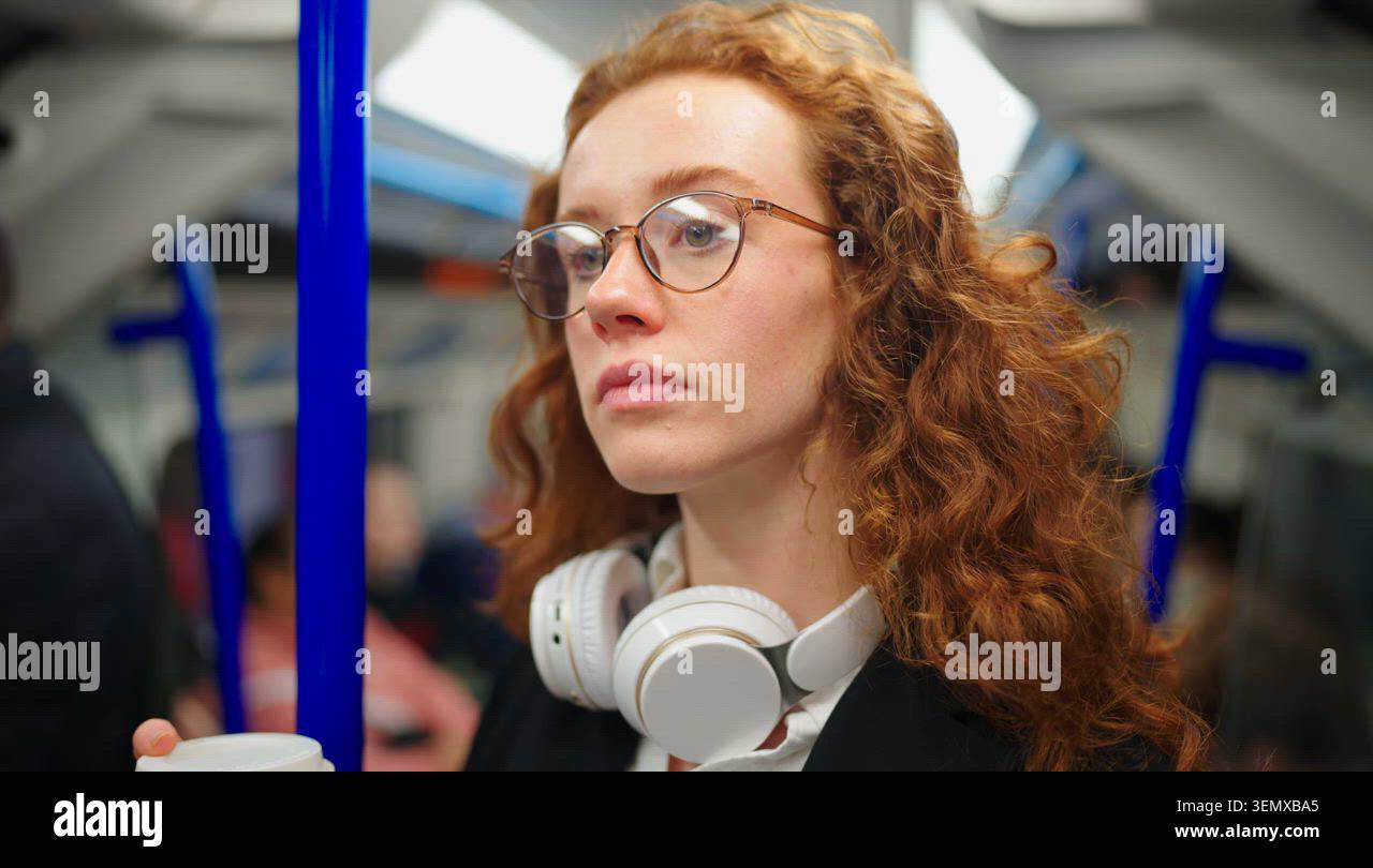 Woman commuting in subway train Stock Video Footage - Alamy