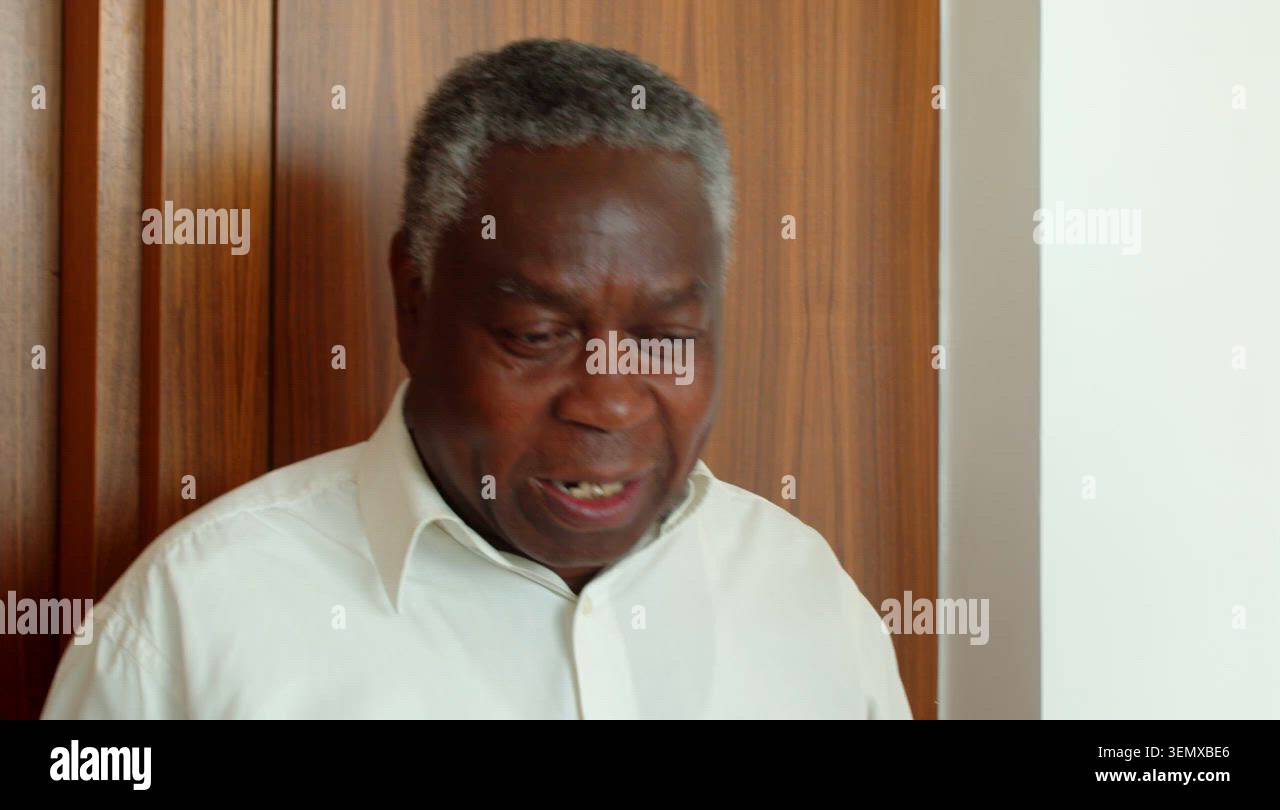 Senior businessman talks indoors Stock Video Footage - Alamy