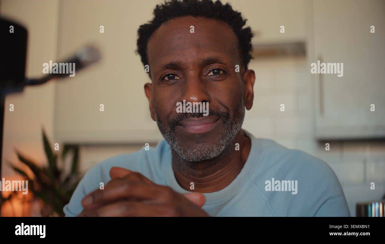 portrait of a man in a modern kitchen looking at camera Stock Video ...