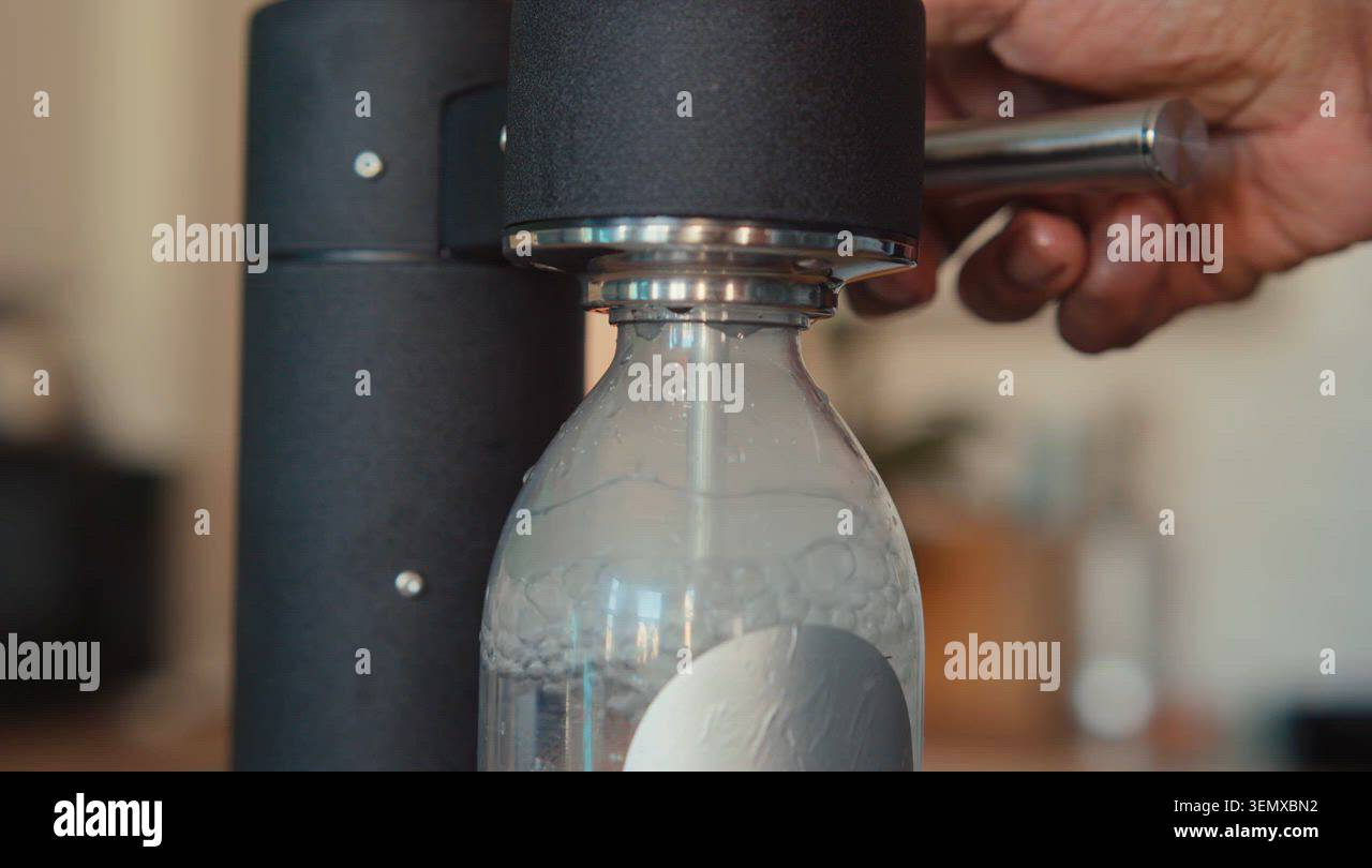 Making Sparkling Water With a Carbonation Machine at Home Stock Video ...
