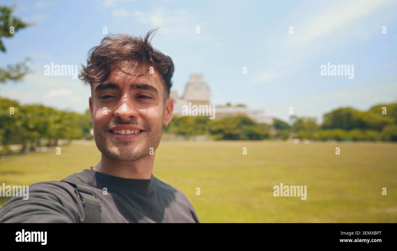 Two friends taking a video selfie with Himeji Castle in the background ...