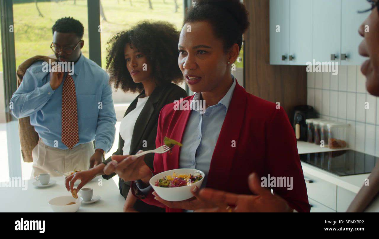 Diverse Team Enjoying Lunch Stock Video Footage - Alamy