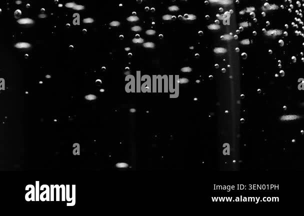 Bubbles Raising on Black Background Stock Video Footage - Alamy
