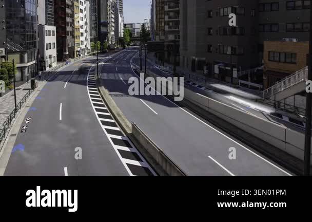 A timelapse of traffic jam at the city street in Shinjuku Tokyo. High ...