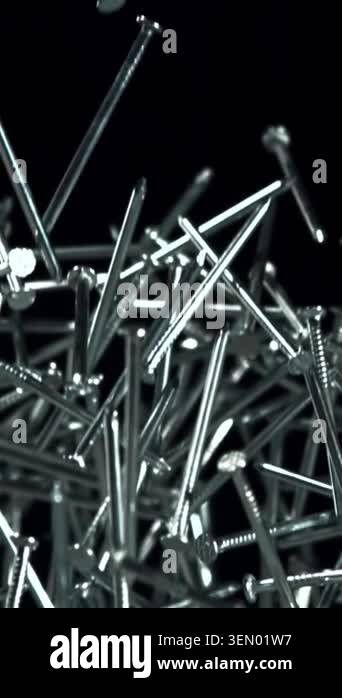 The nails fly up and fall down. Filmed on a high-speed camera at 1000 ...
