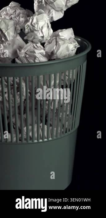The basket flies along with the crumpled paper. Filmed on a high-speed ...