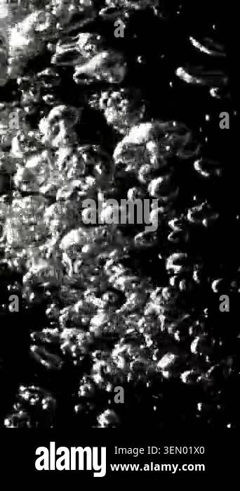Air bubbles in a glass pot. Filmed on a high-speed camera at 1000 fps ...