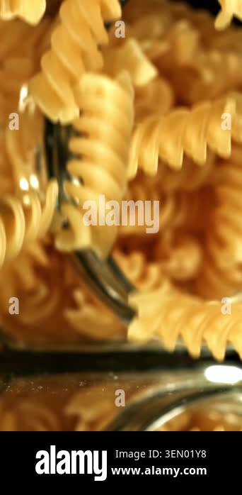 Super slow motion fusilli pasta dry . Filmed on a high-speed camera at ...
