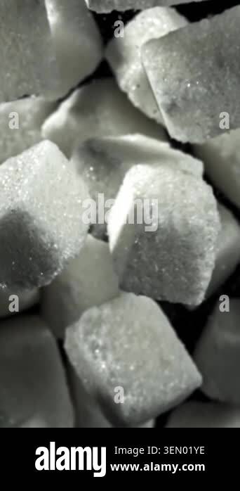 Sugar cubes fly up and down. Filmed on a high-speed camera at 1000 fps ...