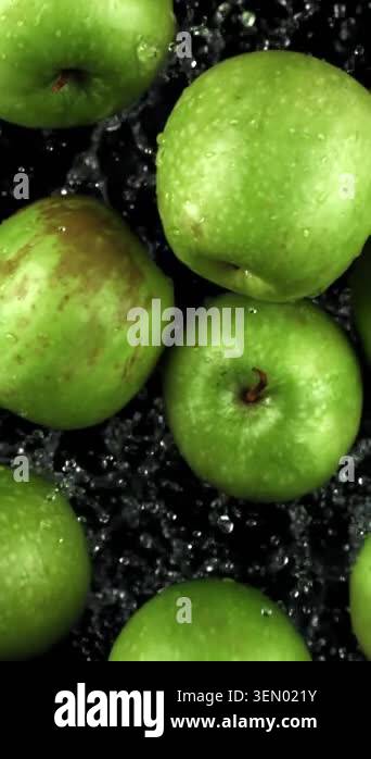 Apples rise and fall. Filmed on a high-speed camera at 1000 fps. High ...