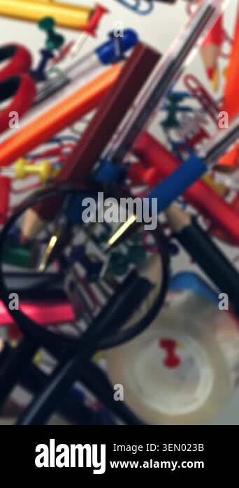 Different school tools fly up and down. Back to school. Filmed on a ...