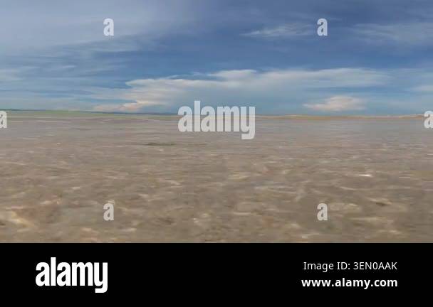 Slow Motion of Ocean Waves Washing Over Sandy Shoreline Stock Video ...