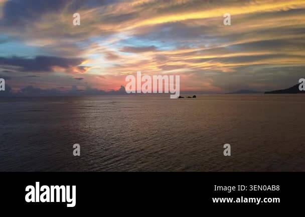 Aerial View of Dramatic Sunset Over the Ocean Stock Video Footage - Alamy