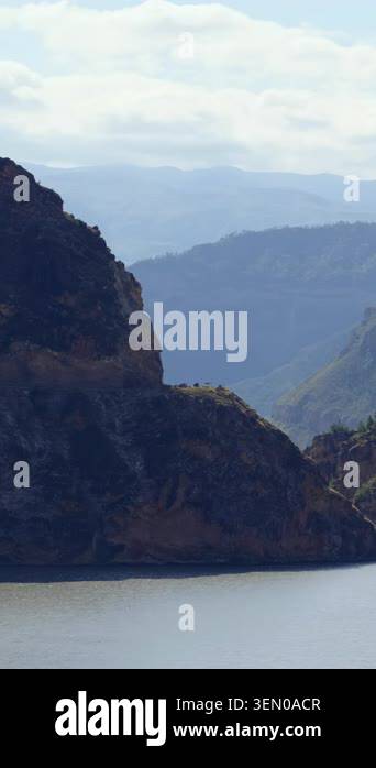 Narrow Reservoir Hugged By Forested Canyon Slopes, Still Water, Layered ...