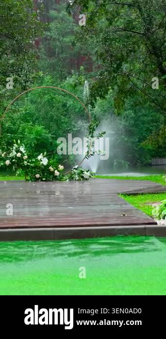 Garden Ceremony Setup With White Chairs Lawn Aisle To Wooden Platform ...