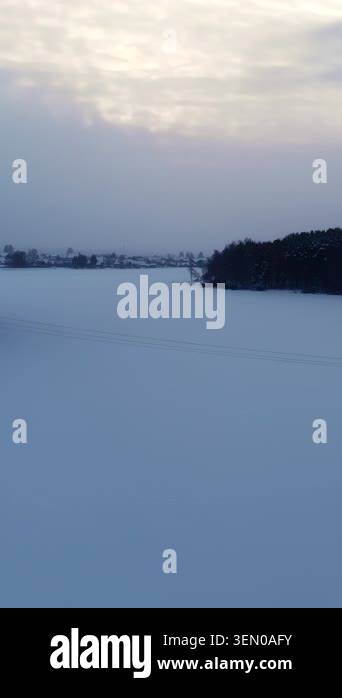 Snowcovered Lake With Pine Islands, Aerial Drone Glide Over Vast Frozen ...
