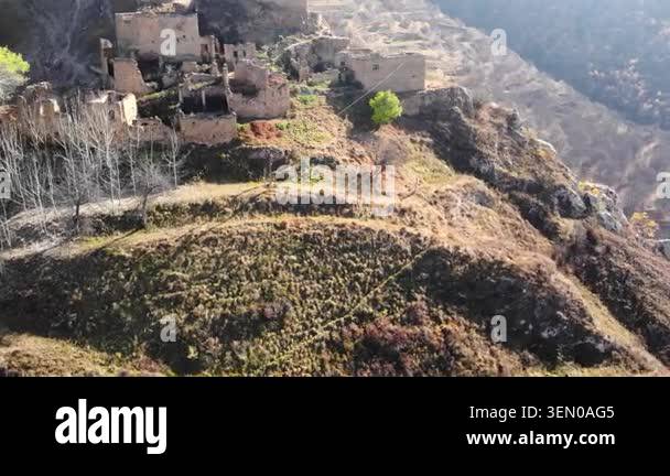 Aerial View Of Terraced Village With Winding Path And Cascading Stream ...