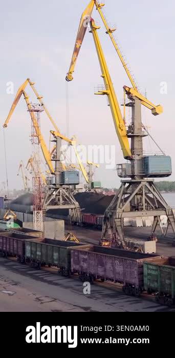 Port Cranes Loading Freight Trains Dock, Yellow Gantry Cranes Lift Bulk ...