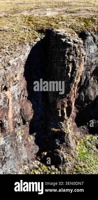 Aerial Drone Footage Waterfall Cliff Edge On Windswept Plateau With ...