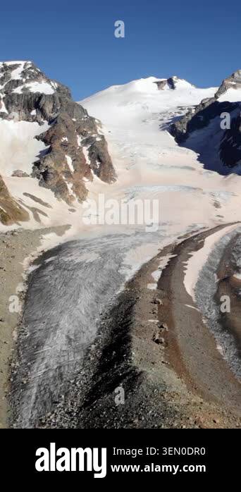 Aerial Glacier Valley With Snow Capped Peaks, Dramatic Drone Footage ...