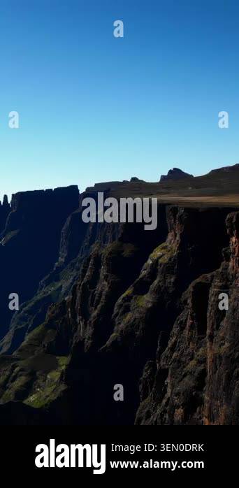 Dramatic Cliffside Panorama At Sunrise Showcasing Sheer Mesa Walls ...