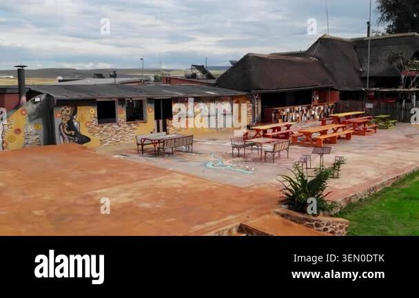 Aerial CloseUp Of House And Pool With Tiled Roof And Shaded Driveway ...