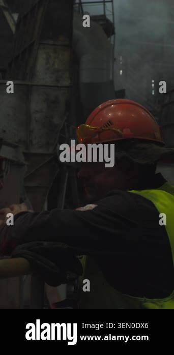 Shift Supervisor In Helmet And Vest Watching Casting Line From Platform ...