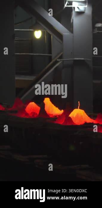 Glowing Hot Billets Traveling On Conveyor Under Plant Lights, Row Of ...