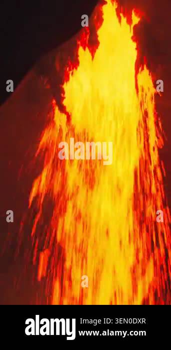 Molten Sparks Showering Like Fiery Waterfall With Vertical Stream Of ...