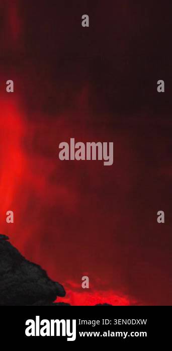 Lavalike Flame Plume Rising Over Rocky Rim, Intense Red Glow And ...