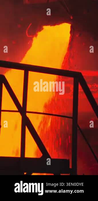 Molten Cascade Flowing Past Platform And Stairs With Silhouette Of Rail ...