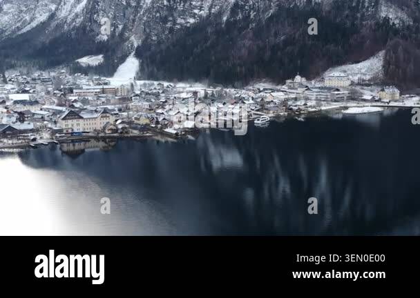 Mirror Calm Lake Reflecting Winter Town And Cliffs, Soft Dawn Light ...