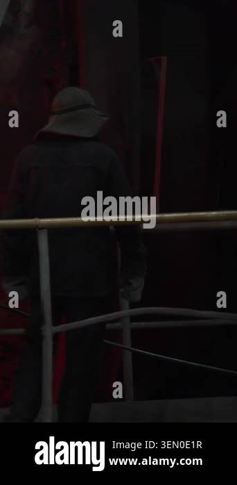 White Metalworker Near Glowing Furnace Interior With Red Hot Light ...