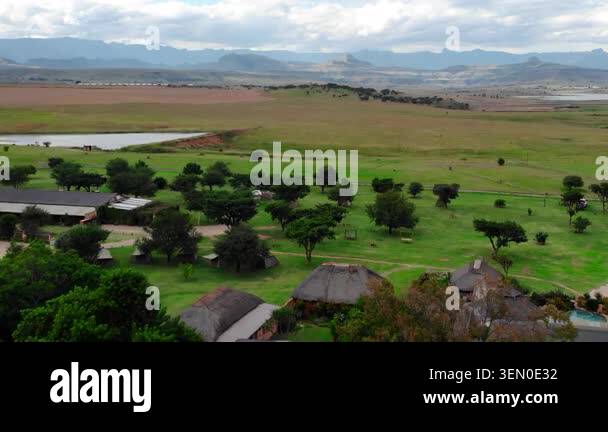 Aerial CloseUp Of House And Pool With Tiled Roof And Shaded Driveway ...