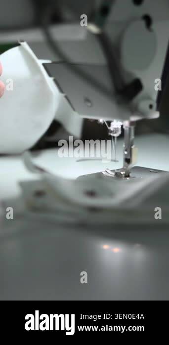 Artisan Hands Guiding Fabric Through Machine. Skilled Operator ...