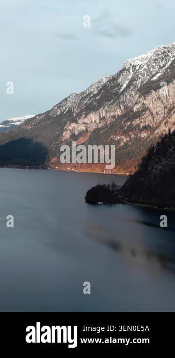 Drone Fjord Dusk Reflective Water, Dark Cliffs Framing Distant ...