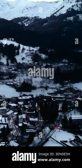 Resort Town Evening Lights On Snow Covered Streets, Panoramic Aerial Of ...